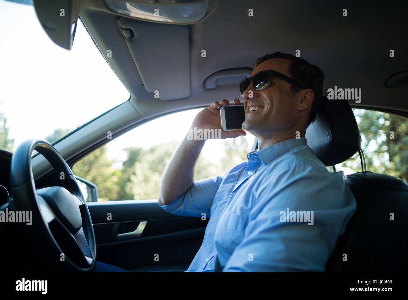 Talking while driving hi-res stock photography and images - Alamy