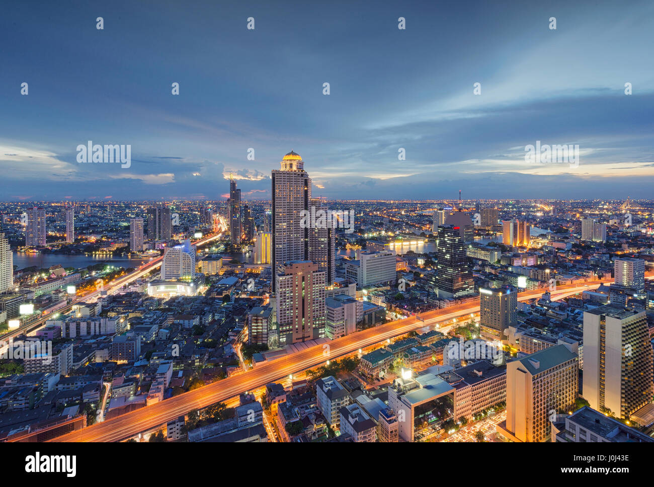 Buildings in Bangkok at sunset, Skyline, Thailand Stock Photo - Alamy