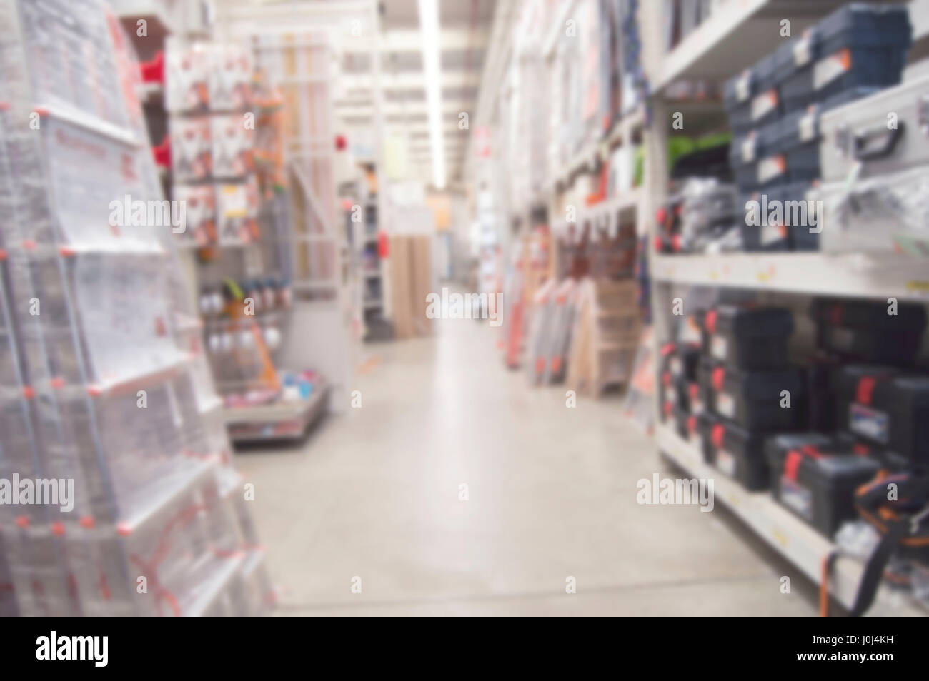 blurred background of the hardware store with merchandise on display ...
