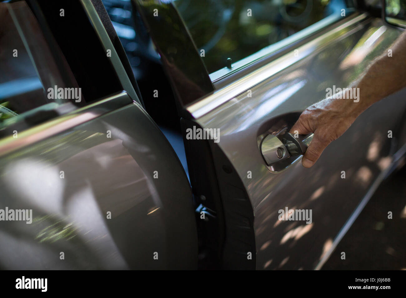 Opening car door hand hi-res stock photography and images - Alamy