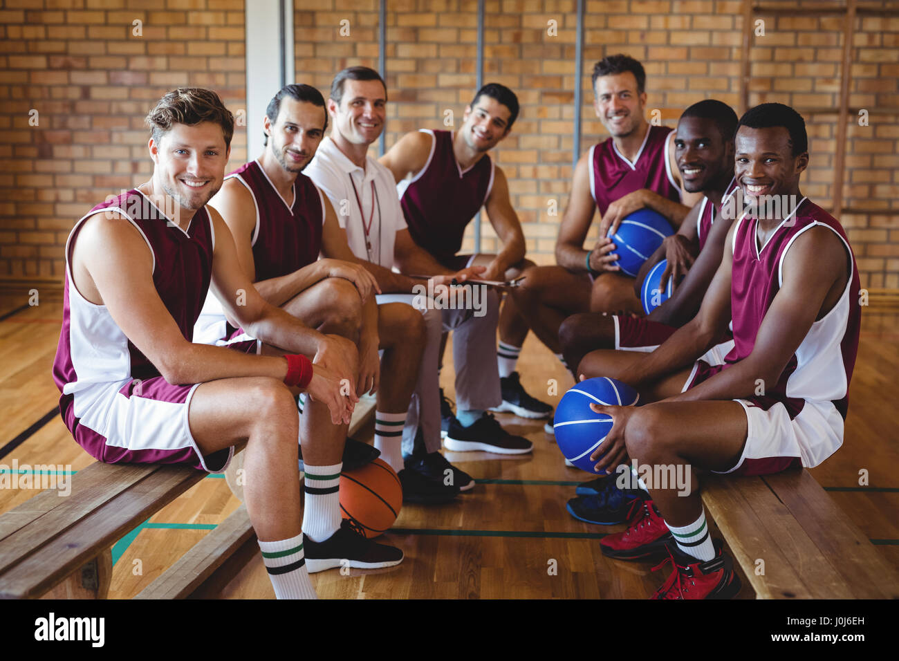 Professional adult coach sitting on hi-res stock photography and images ...