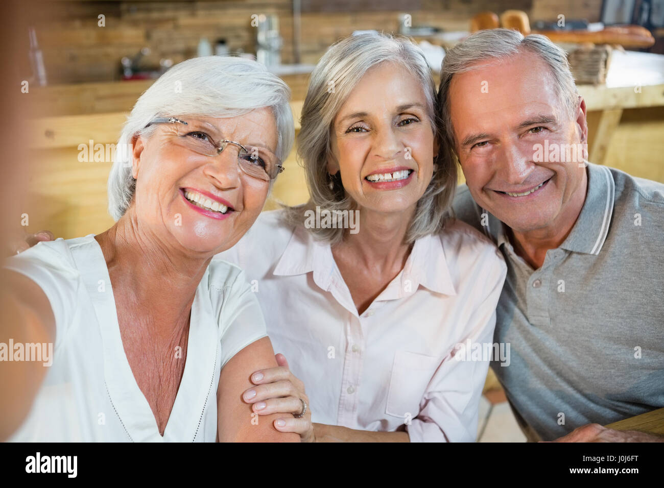Group of senior friends having fun together in cafÃƒÂ© Stock Photo - Alamy