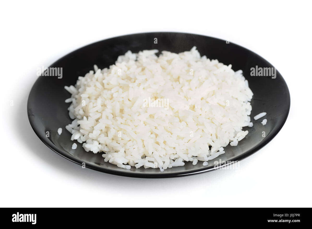 Plate of rice isolated on white background Stock Photo - Alamy