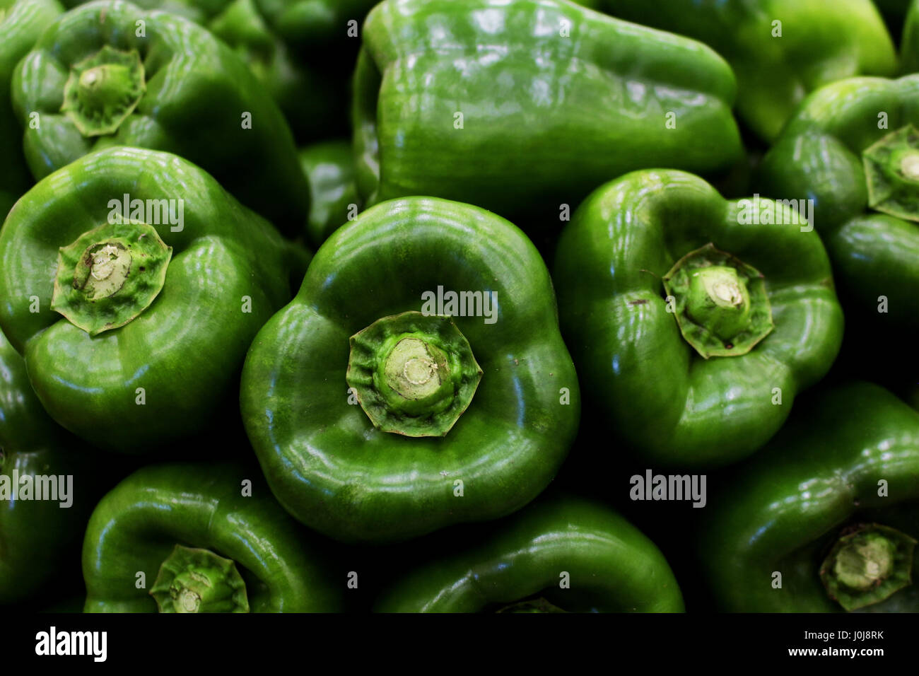 Green peppers texture background Stock Photo - Alamy