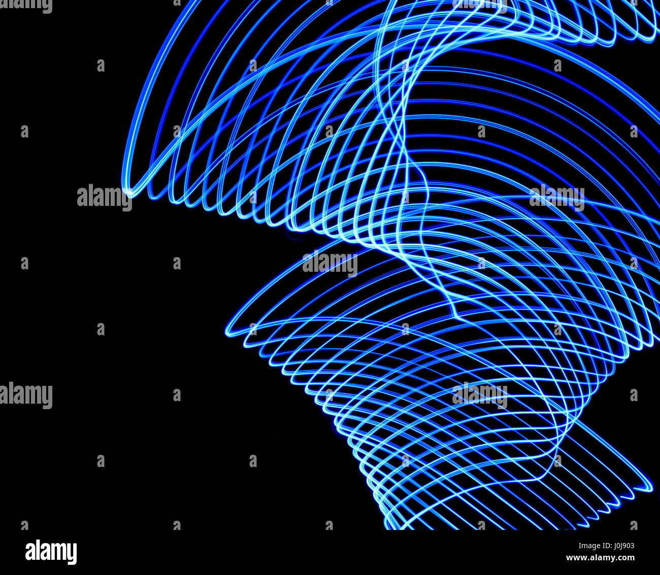 Blue light painting photography - parallel lines in a swirling pattern ...