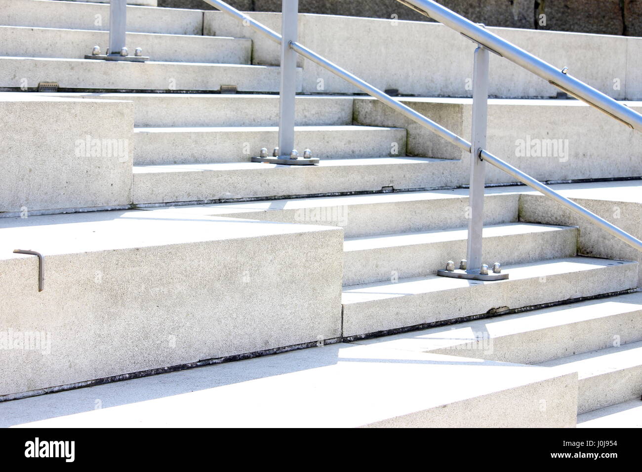 Urban architecture - steps of an ampitheatre, with metal railings, in ...
