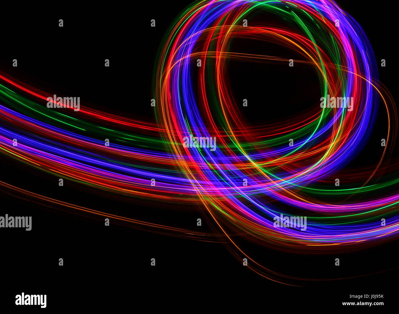 Multi-coloured light painting photography - movement and motion on a ...