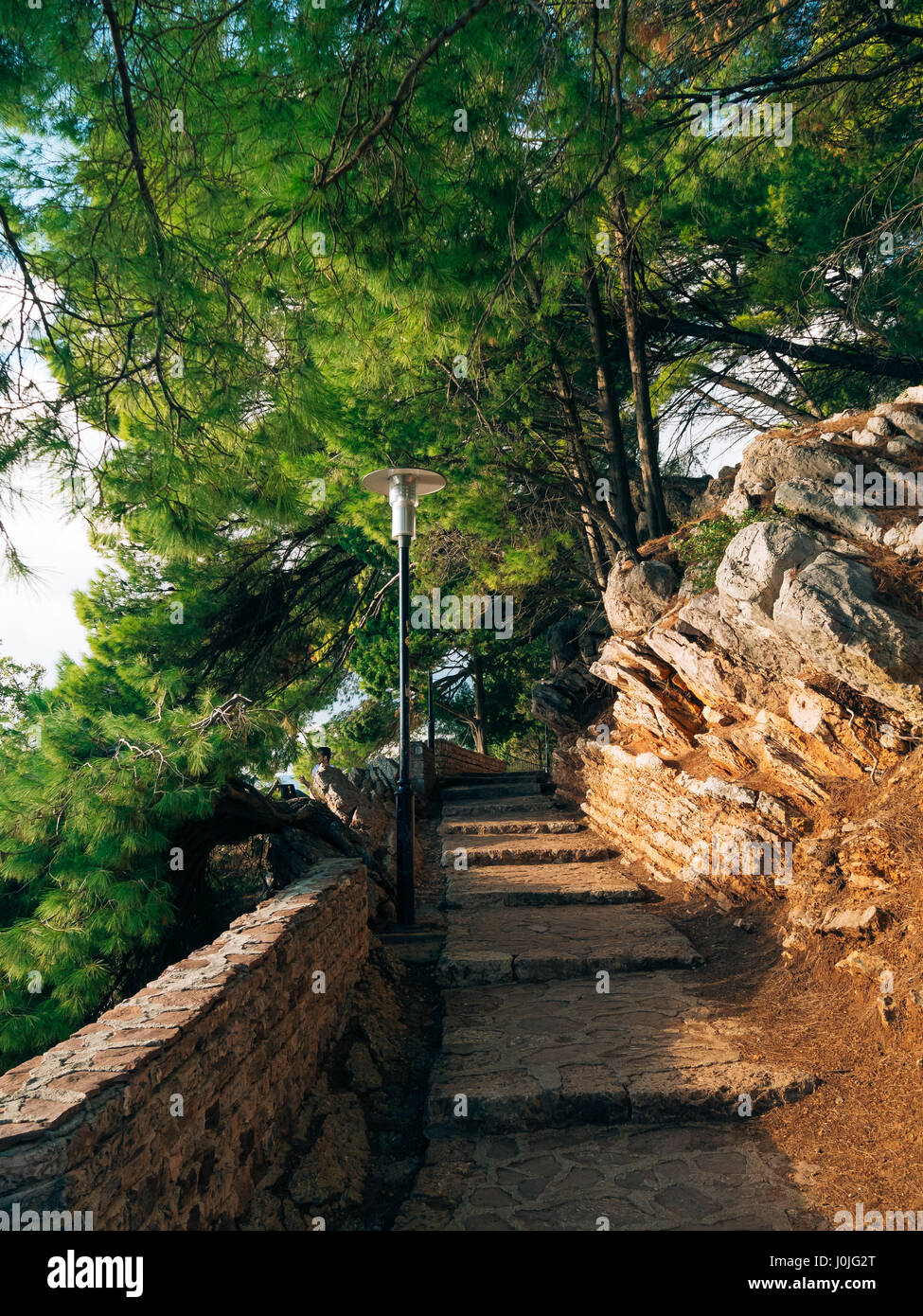 Stone stairs in Montenegro, in the Park Milocer, Sveti Stefan Stock ...