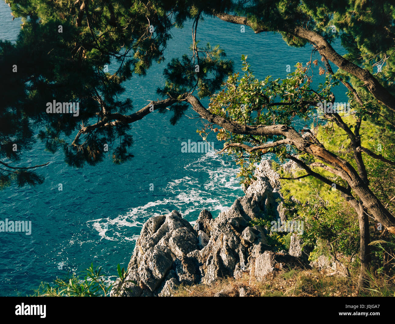 Rocks on the sea in Montenegro. Rocky coast. Wild beach. Dangerous ...