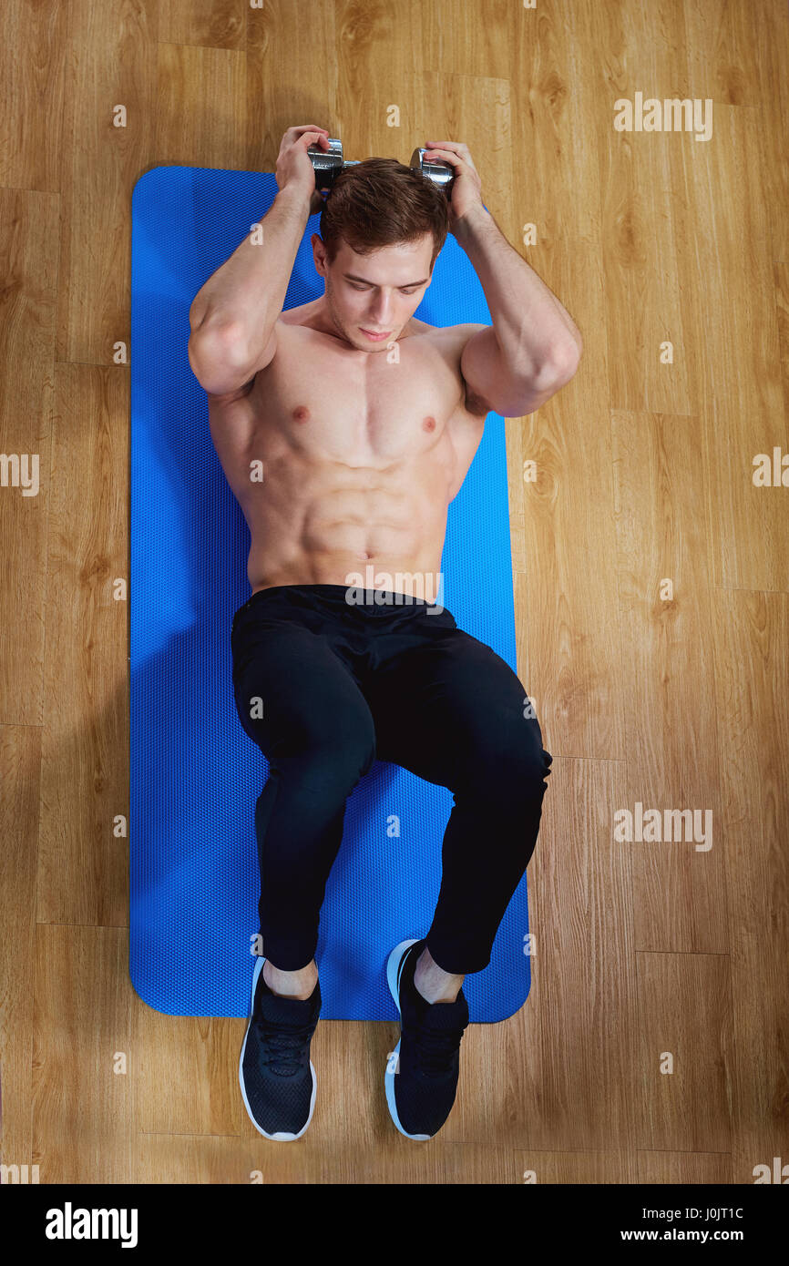 Top view sport.Man athlete doing exercise training on the floor Stock ...