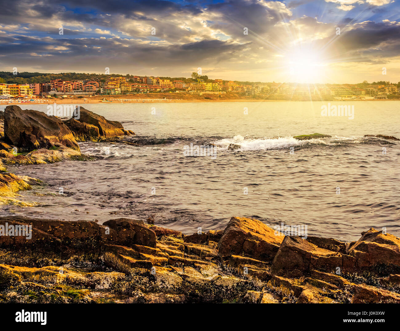 SOZOPOL, BULGARIA - SEPTEMBER 11, 2013: rocky shore and sandy city ...