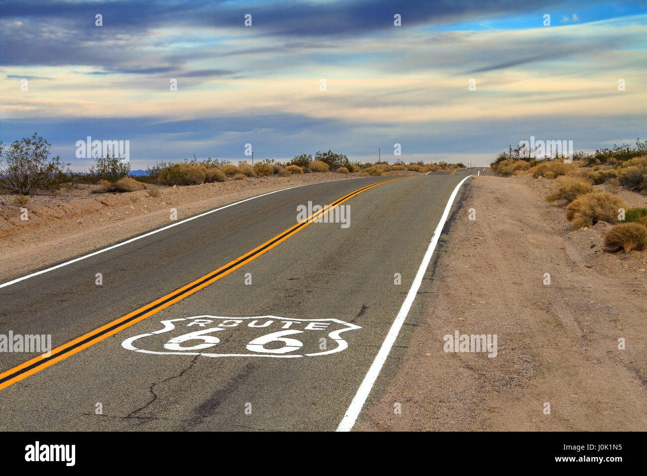 Route 66 road sign on the floor of the highway Stock Photo - Alamy