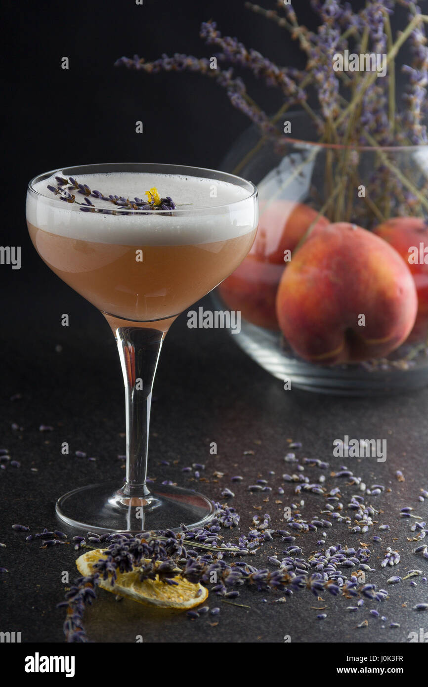 Gin shaken with peaches, lemons and home made lavender syrup Stock ...