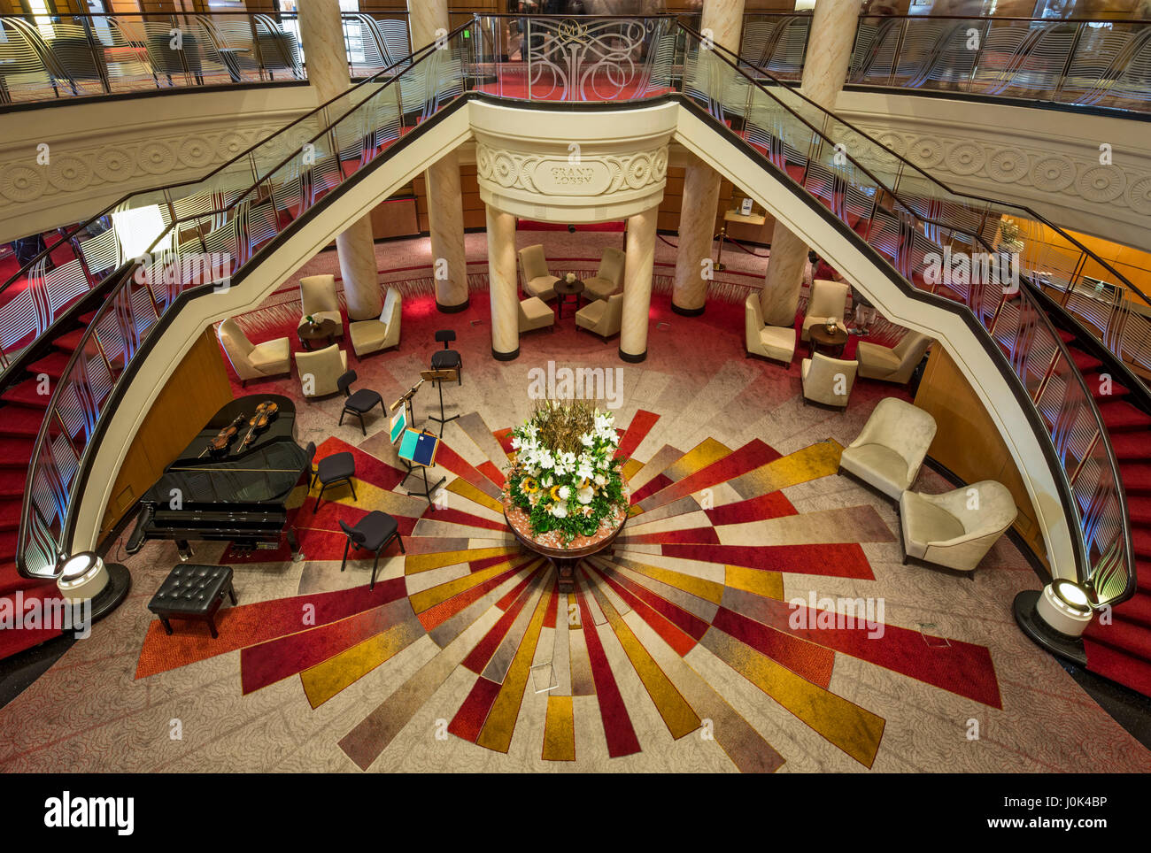 Lounge in central atrium -Interior of the Queen Mary 2. Cunard Queen ...