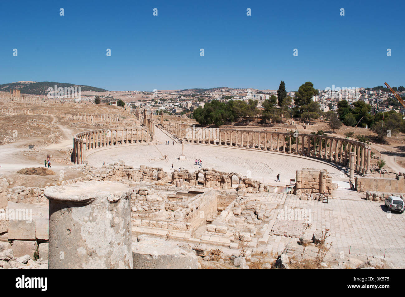 Skyline of modern Jerash with the Oval Plaza, main square of the ...