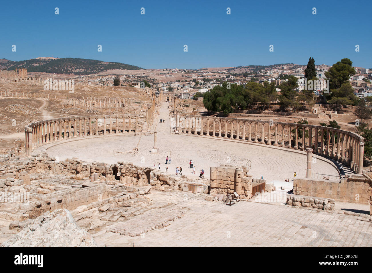 Skyline of modern Jerash with the Oval Plaza, main square of the ...