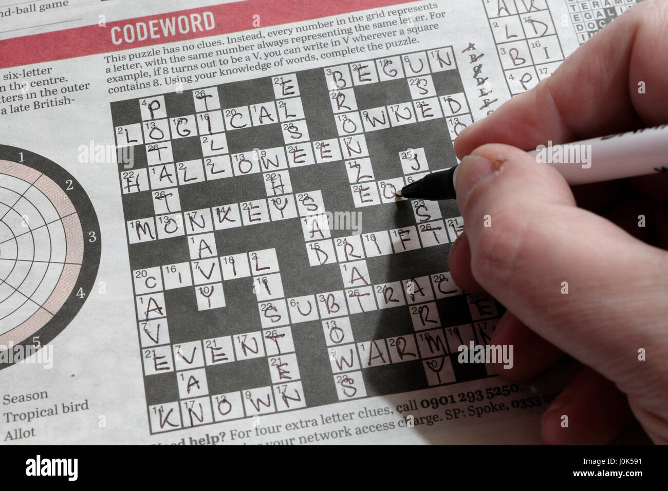 Crossword Puzzle Newspaper Stock Photos & Crossword Puzzle Newspaper ...