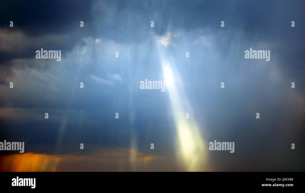 Rain clouds at sunset hi-res stock photography and images - Alamy