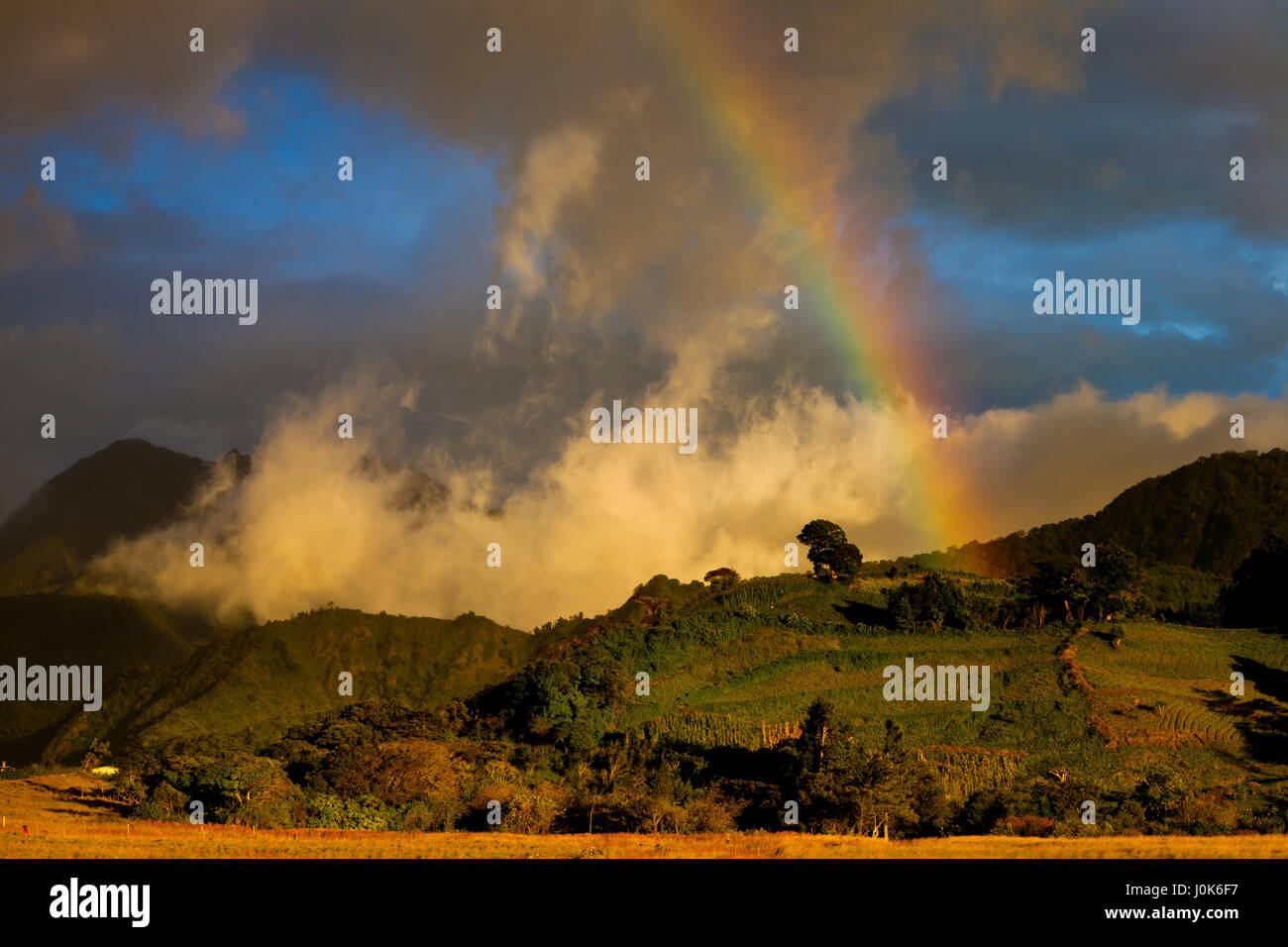 Panama landscape with rainbow at sunset at the border of Volcan Baru ...