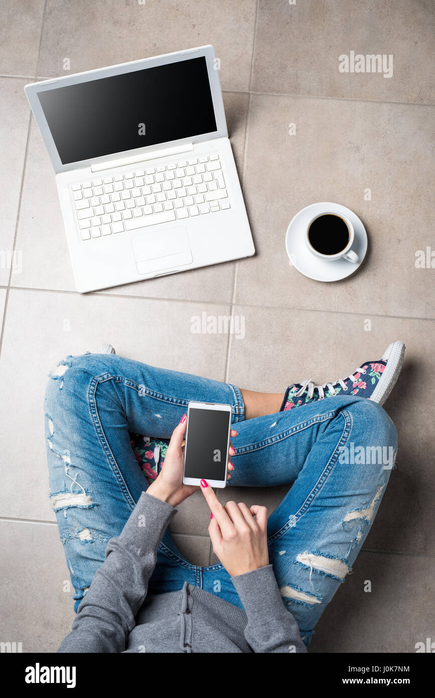 Woman using white smart hi-res stock photography and images - Alamy