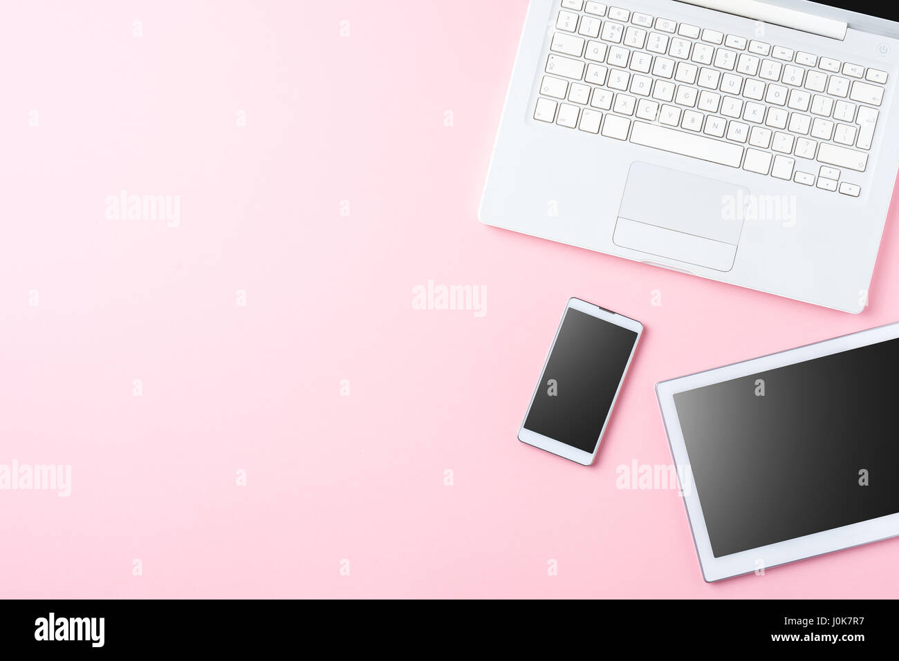 Technology background with modern white computer, tablet and smart ...