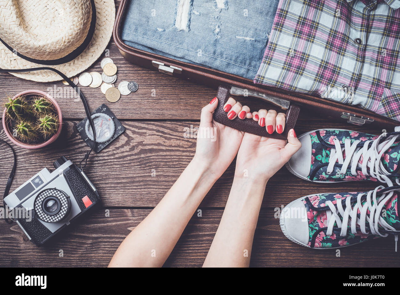 Travel background with open suitcase and accessories. Top view Stock ...