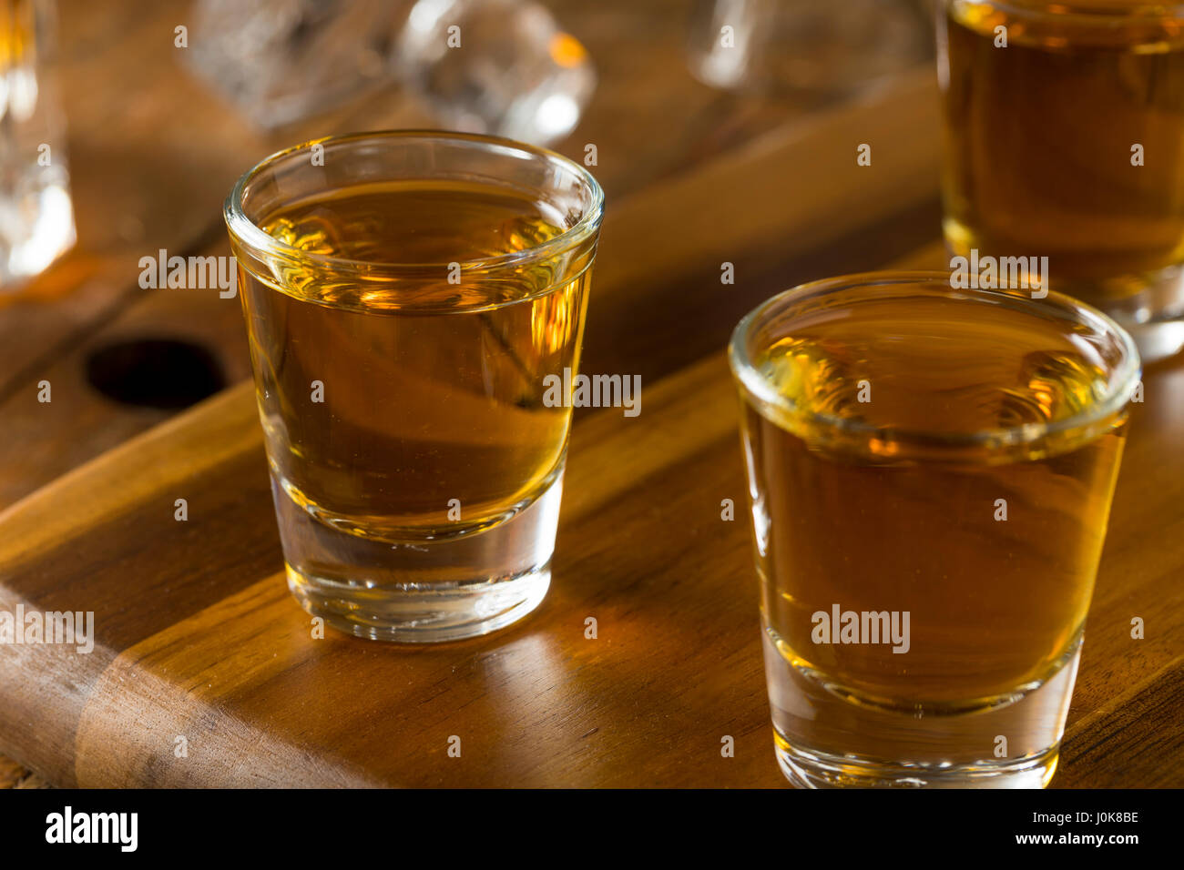 Group of Bourbon Whiskey Shots Ready to Drink Stock Photo - Alamy