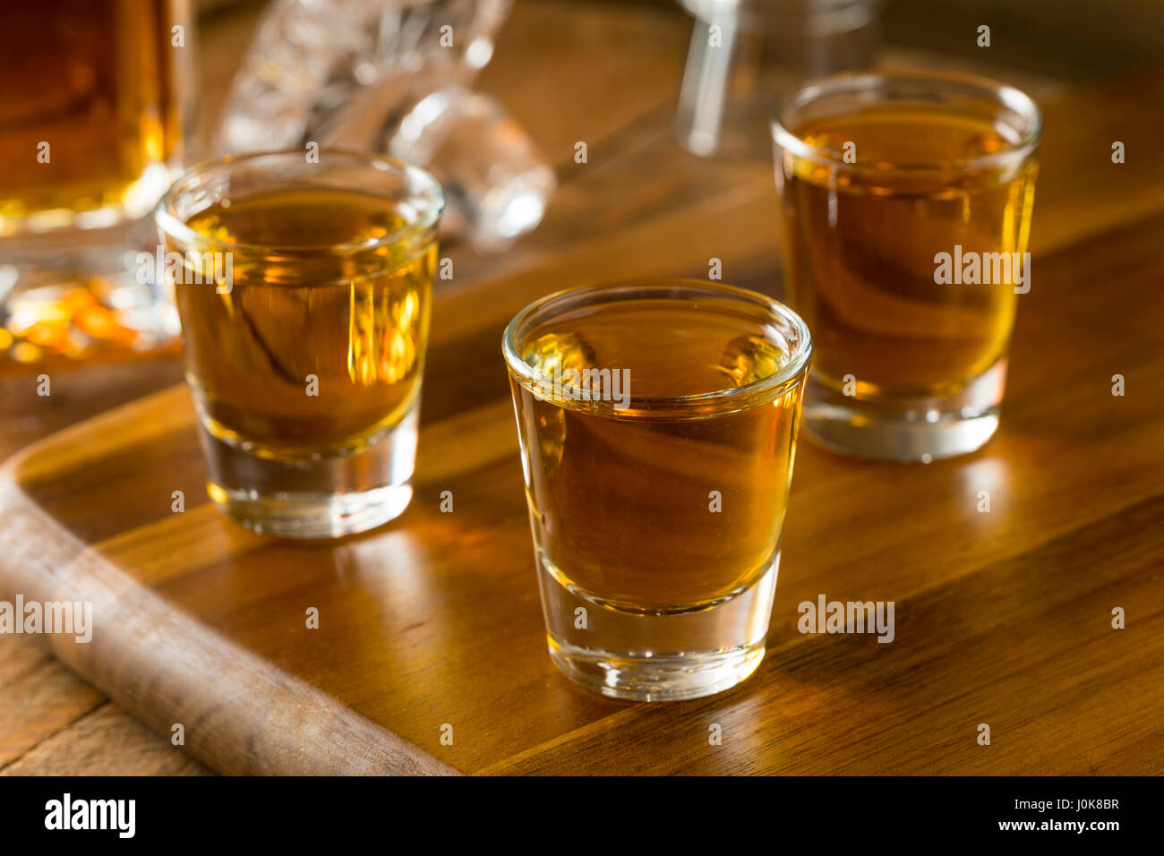 Group of Bourbon Whiskey Shots Ready to Drink Stock Photo - Alamy