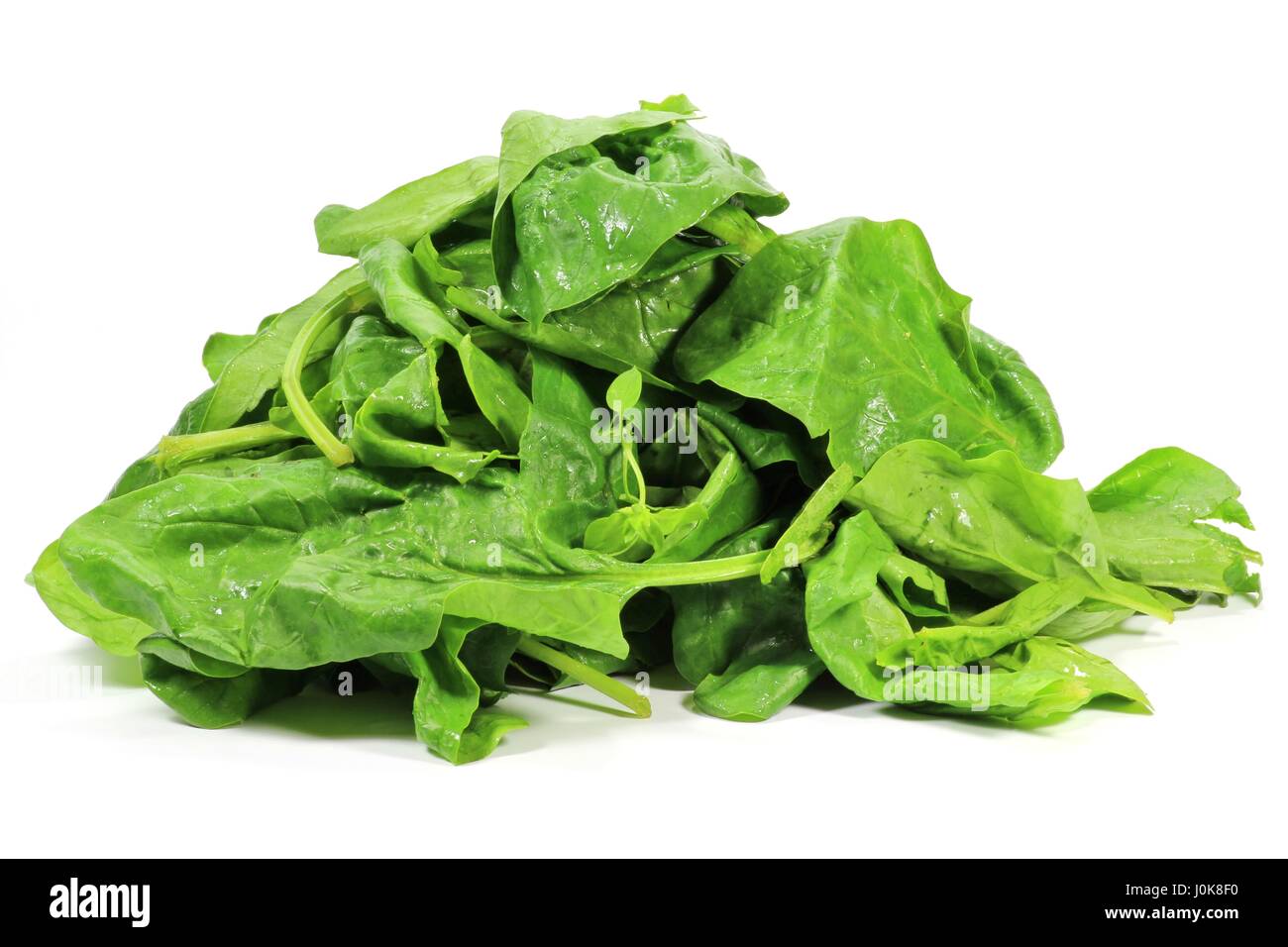 fresh spinach in a paper bag isolated on white background Stock Photo ...