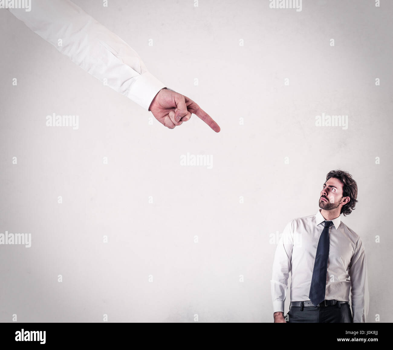 Hand blaming businessman Stock Photo - Alamy