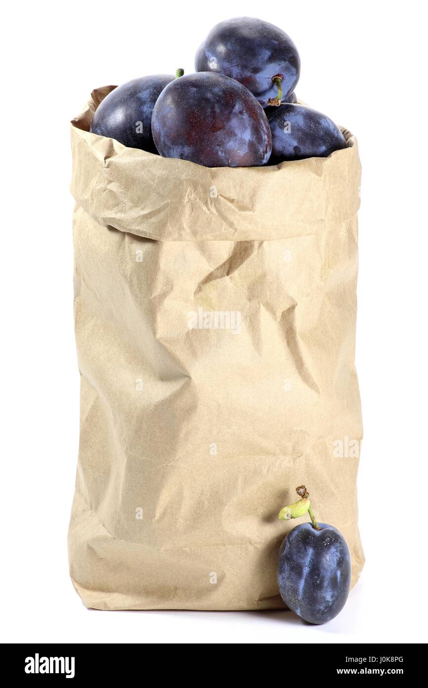damson plums in a paper bag isolated on white background Stock Photo ...
