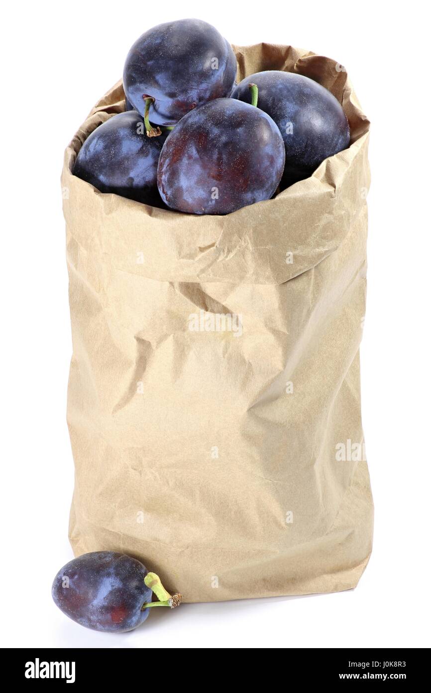 damson plums in a paper bag isolated on white background Stock Photo ...