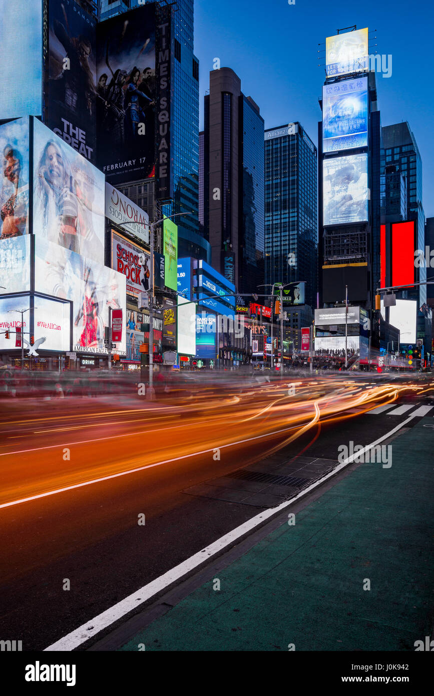 Times Square buildings with orange car lights long exposure in ...