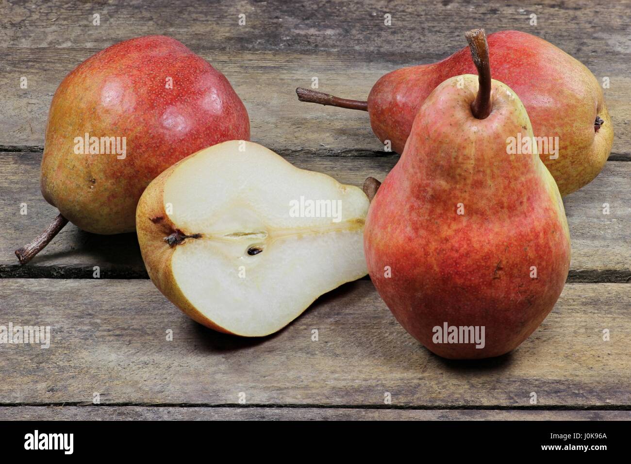 pears (variety Red Bartlett) on wooden background Stock Photo - Alamy
