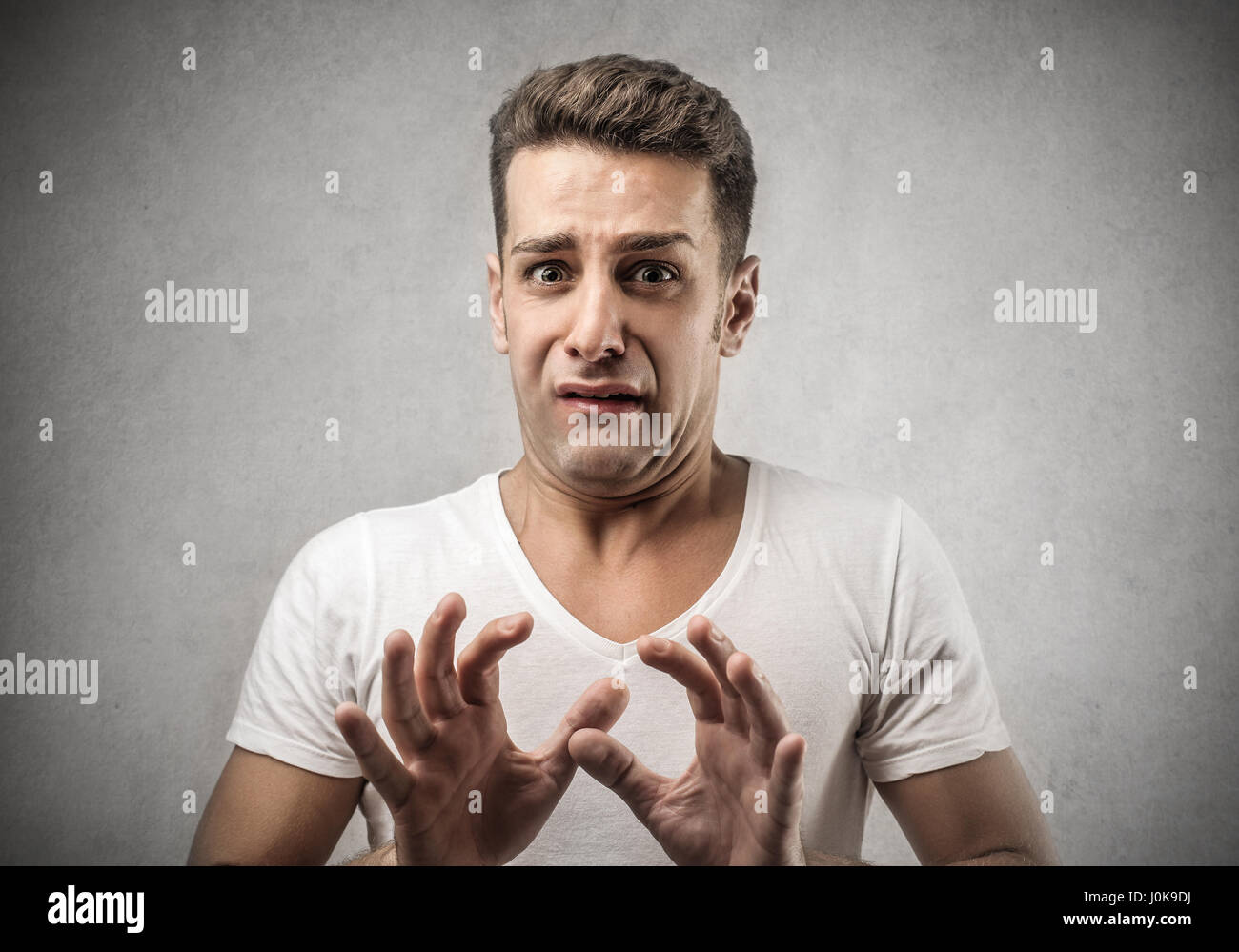Man being scared Stock Photo - Alamy