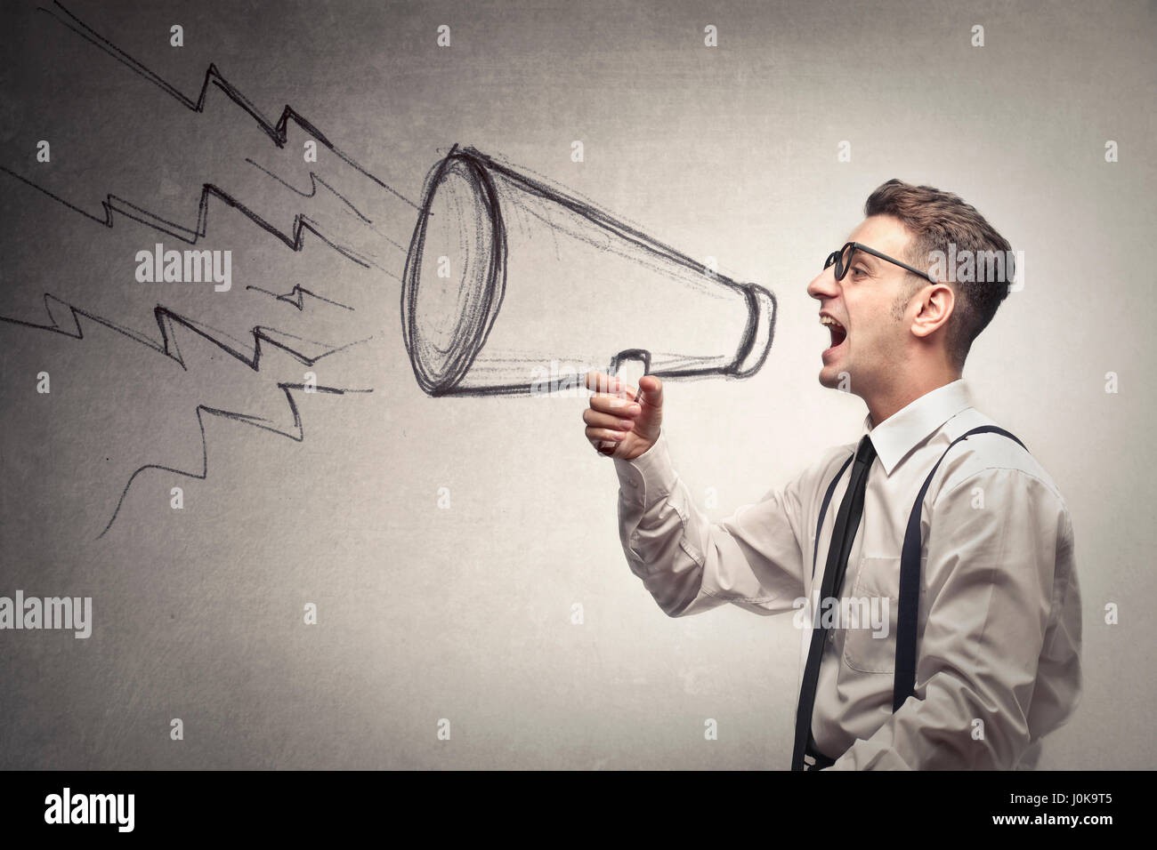 Man megaphone hi-res stock photography and images - Alamy