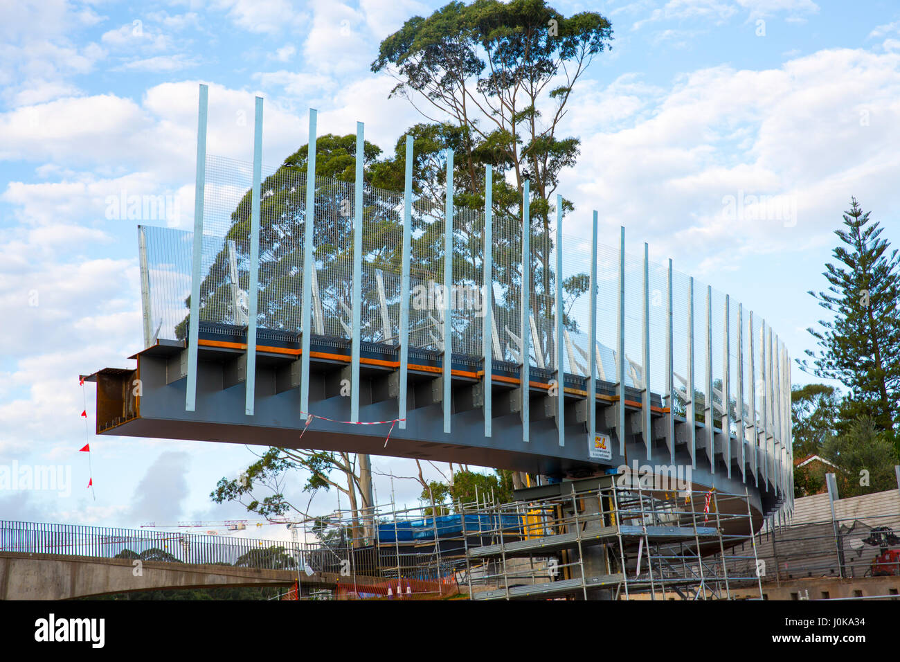 Road footbridge partially complete spanning across Warringah road in ...