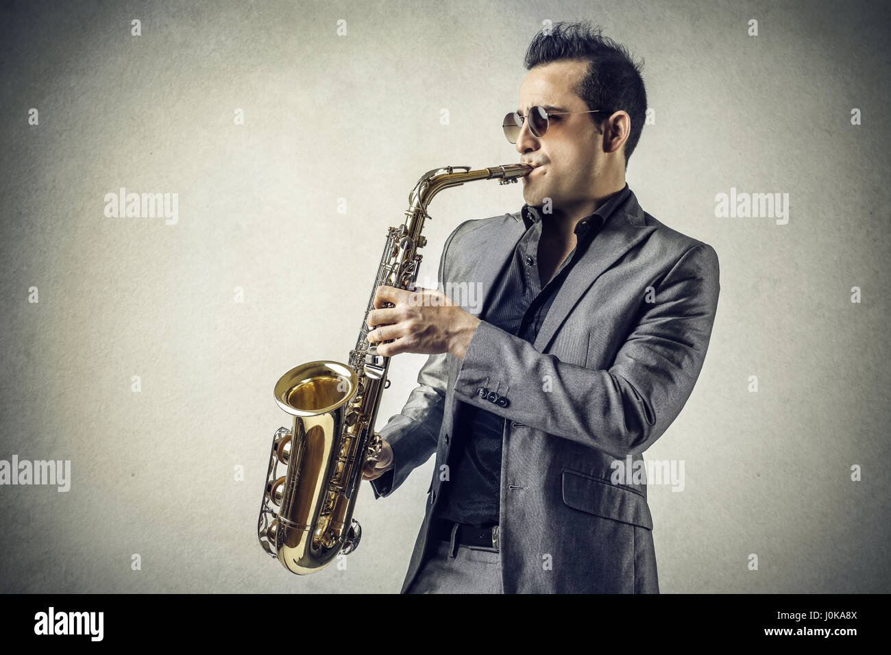Man with saxophone Stock Photo - Alamy