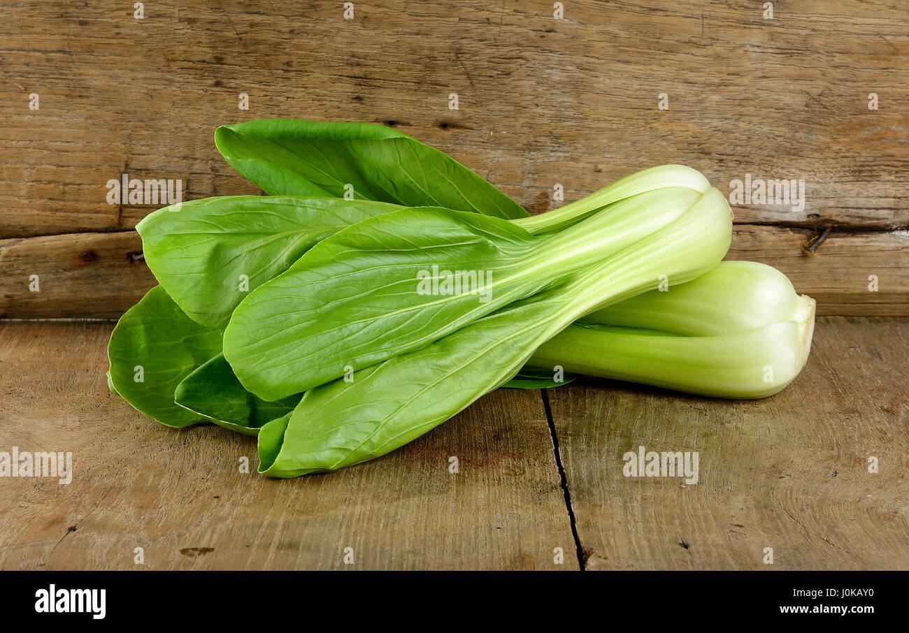 Bok choy vegetable on the wooden background Stock Photo - Alamy