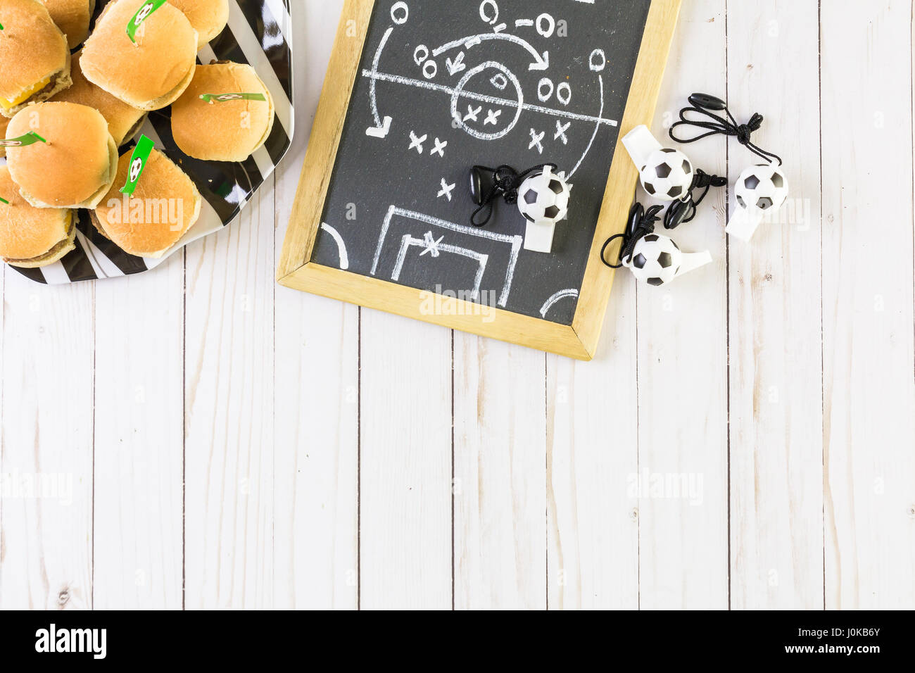 Table with snacks for football party Stock Photo - Alamy