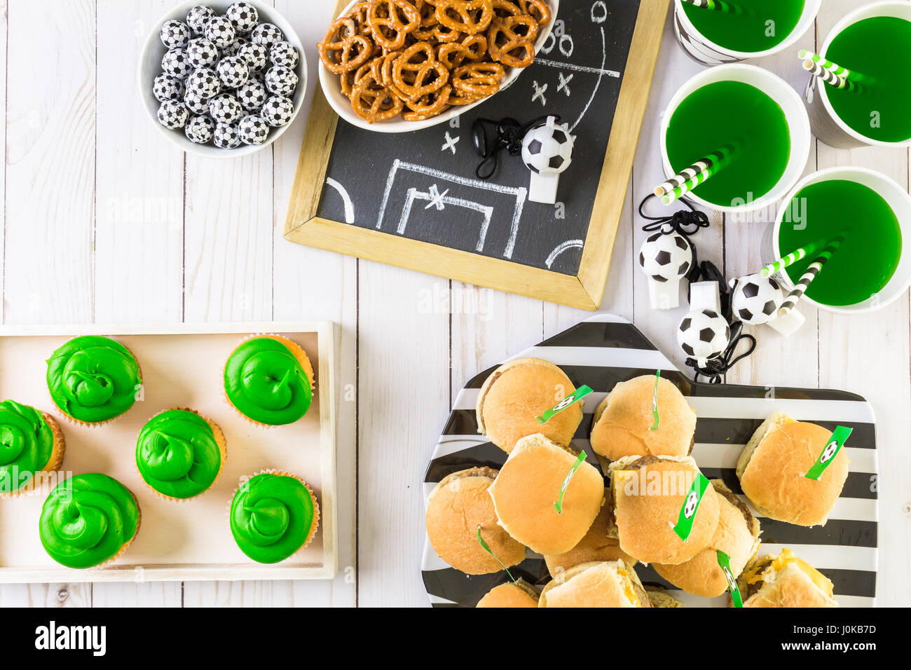 Table with snacks for football party Stock Photo - Alamy