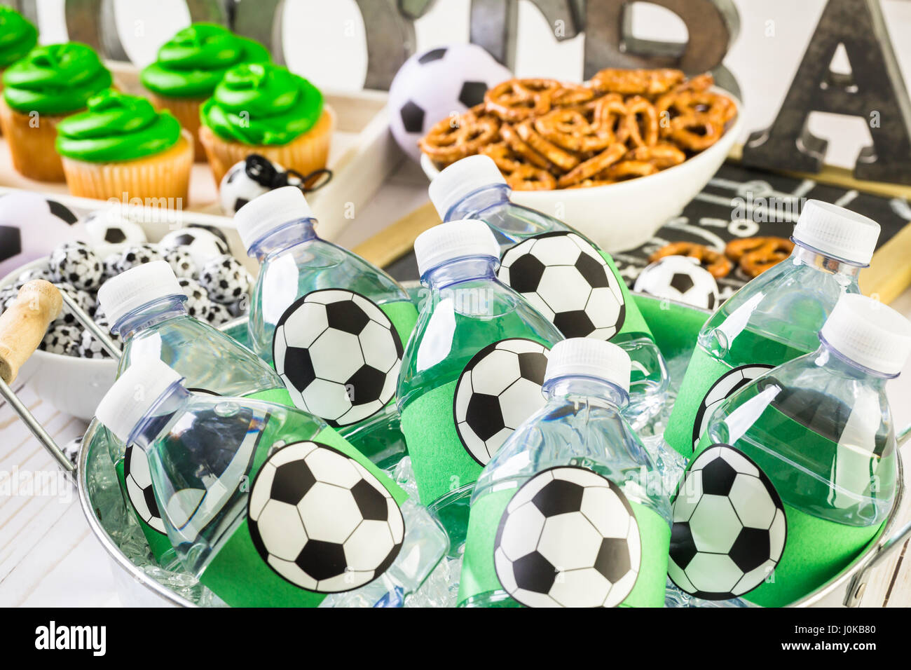 Table with snacks for football party Stock Photo - Alamy
