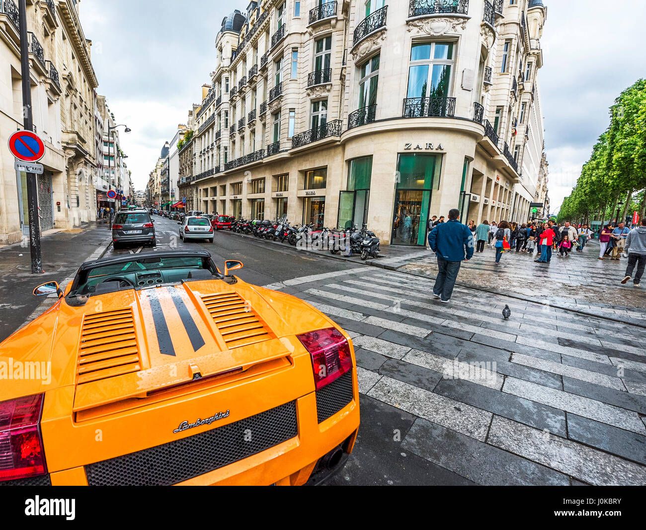 Ferrari test drive at Champs Élysées Stock Photo - Alamy