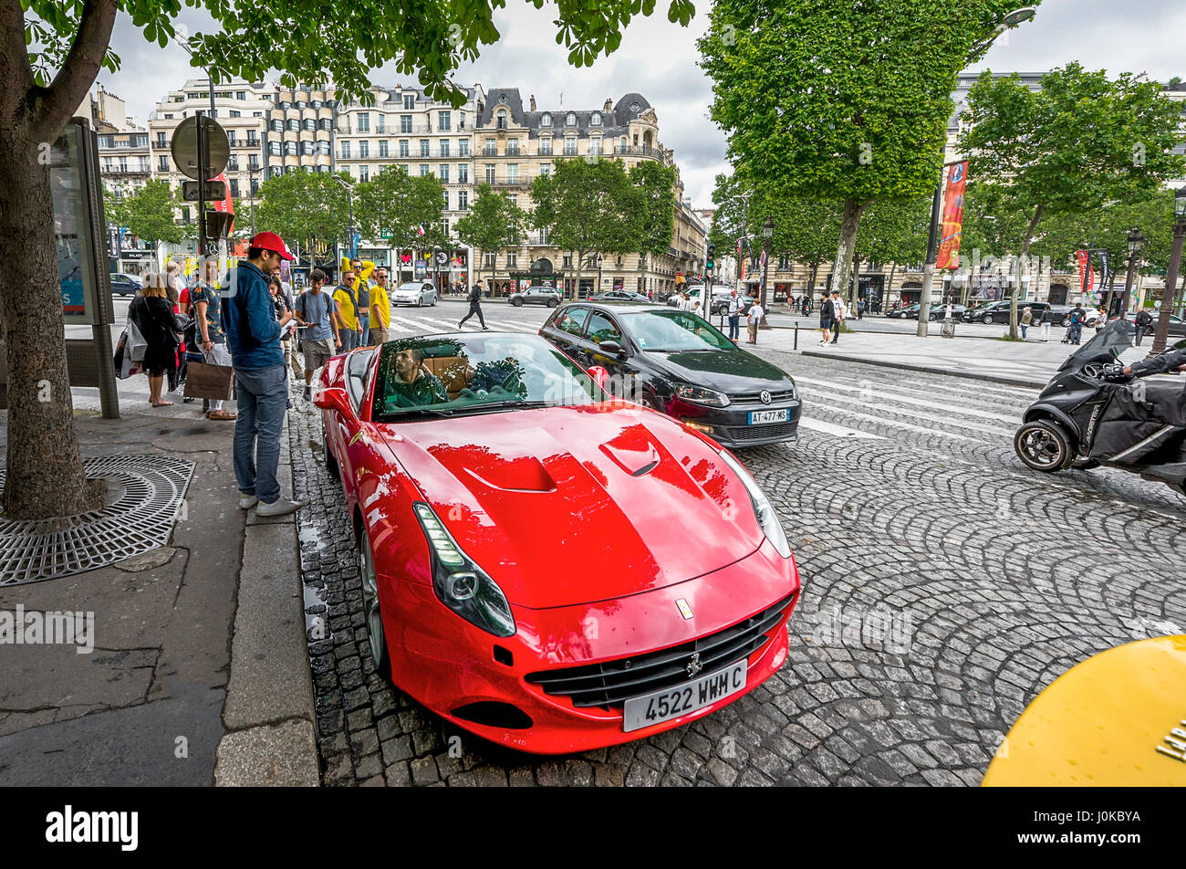 Ferrari test drive at Champs Élysées Stock Photo - Alamy