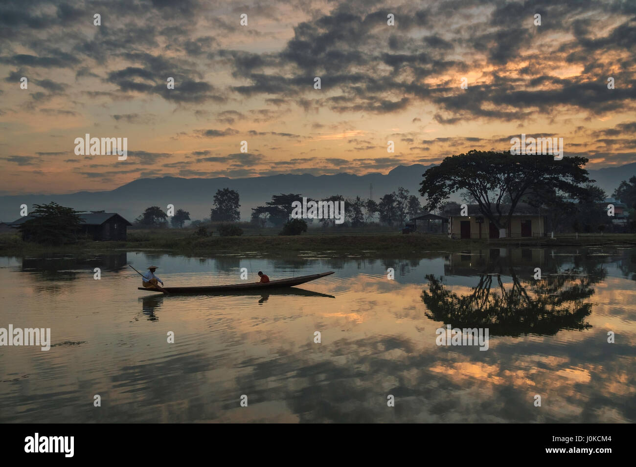 Small boat on Thazi lake, Shan state, Myanmar during sunrise Stock ...