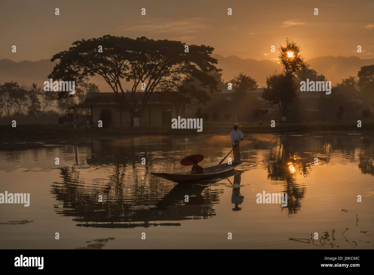 Beautiful sunrise at Thazi lake, Shan state, Myanmar Stock Photo - Alamy