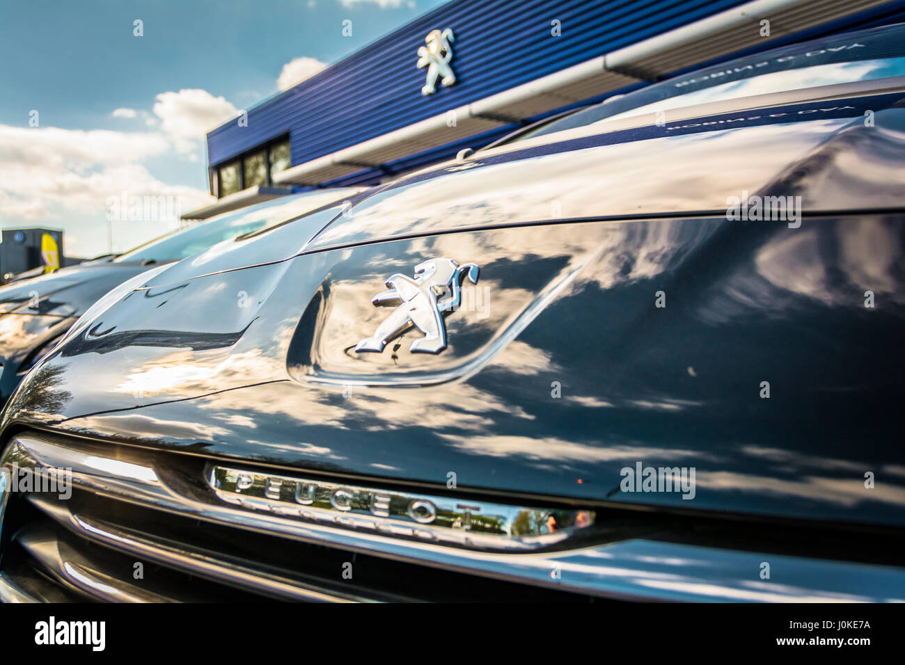 Peugeot cars displaying the Julien BLAZER logo and mascot Stock Photo ...