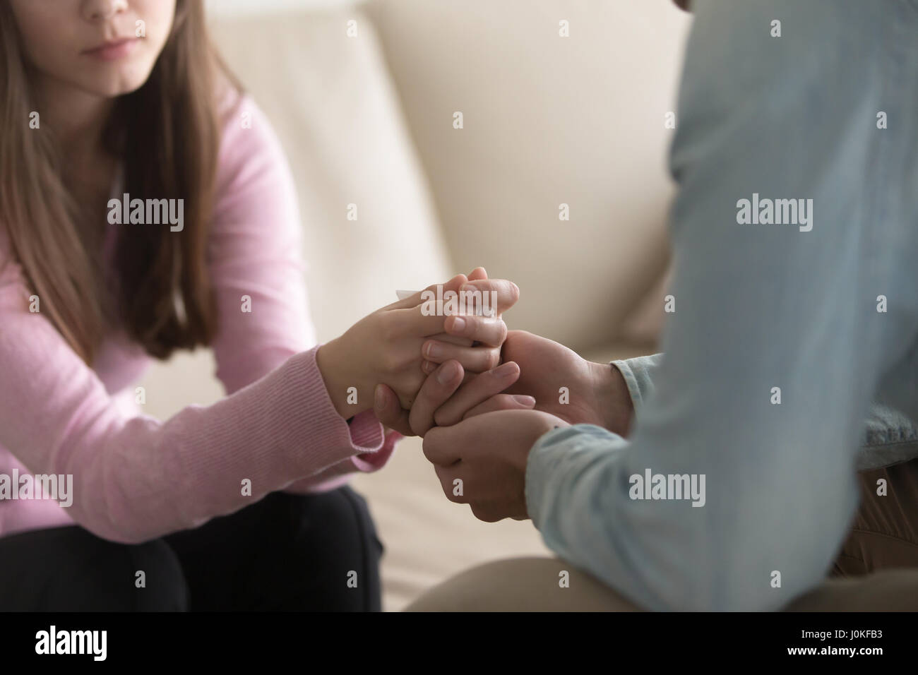 Woman crying man comforting hi-res stock photography and images - Alamy