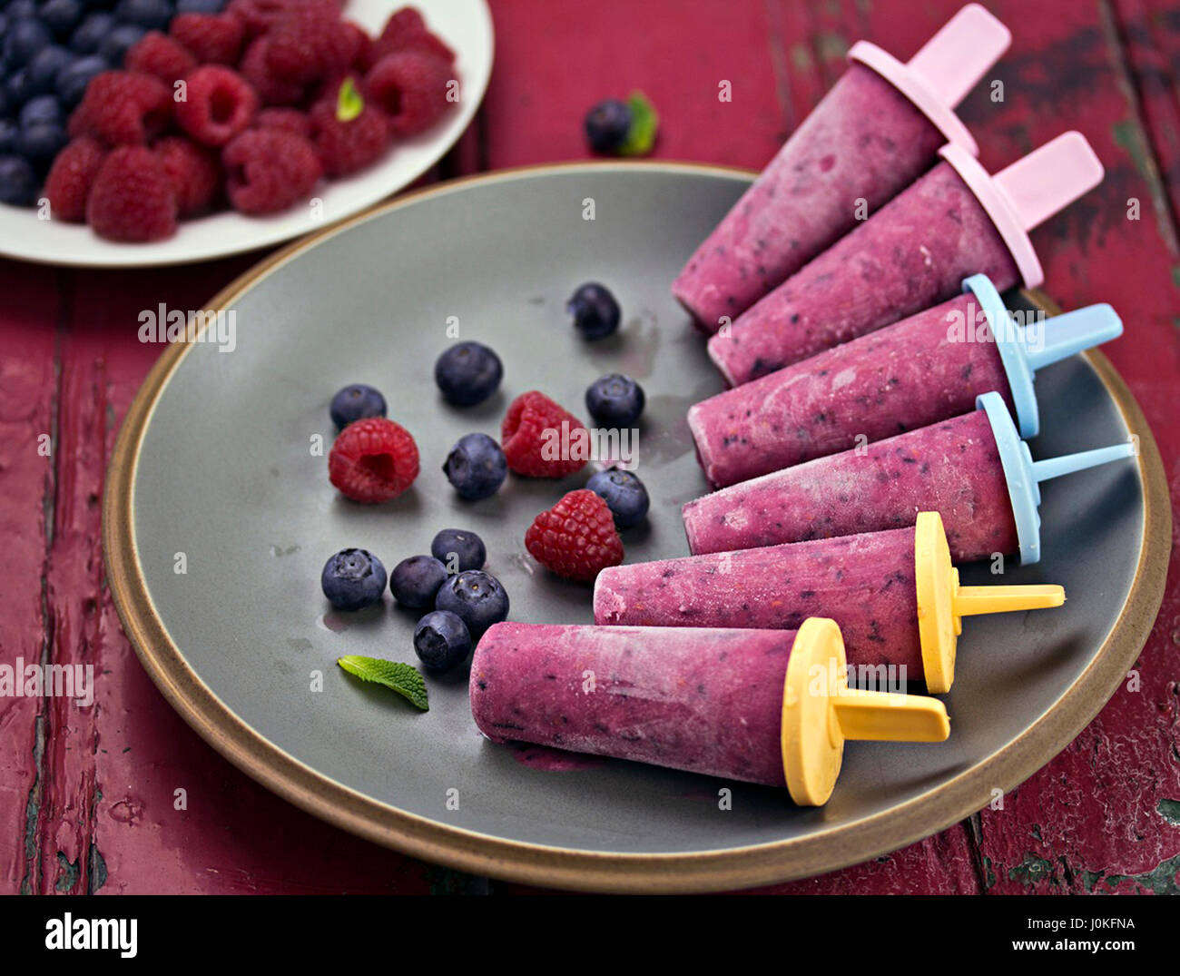 Blueberry, raspberry ice cream popsicle Stock Photo - Alamy