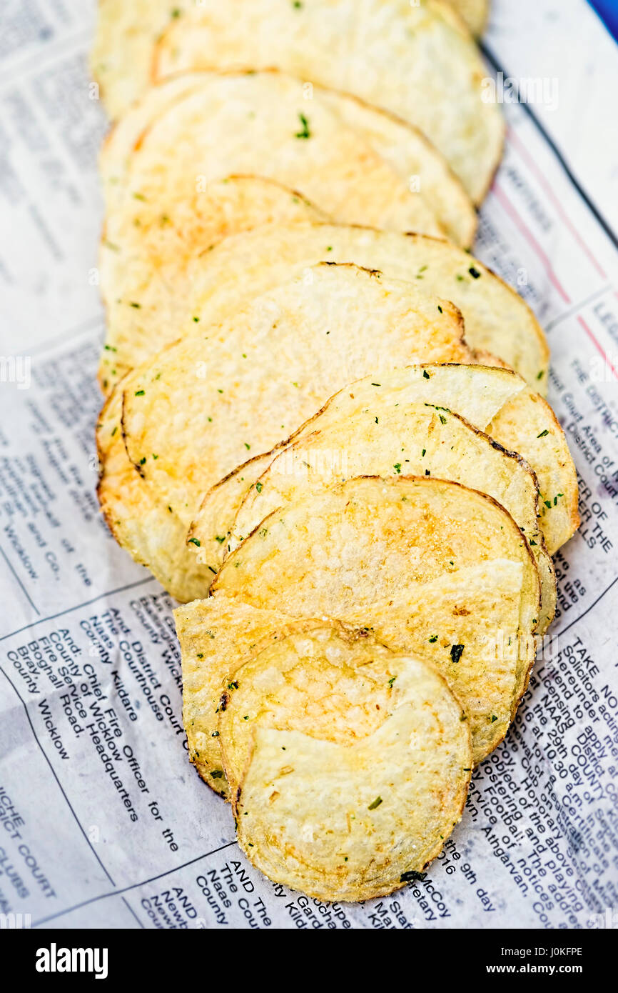 Stack of potato crisps isolated on white background Stock Photo - Alamy